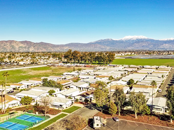 Mountain backdrop frames this desert oasis where Social Security checks stretch like taffy in summer heat.