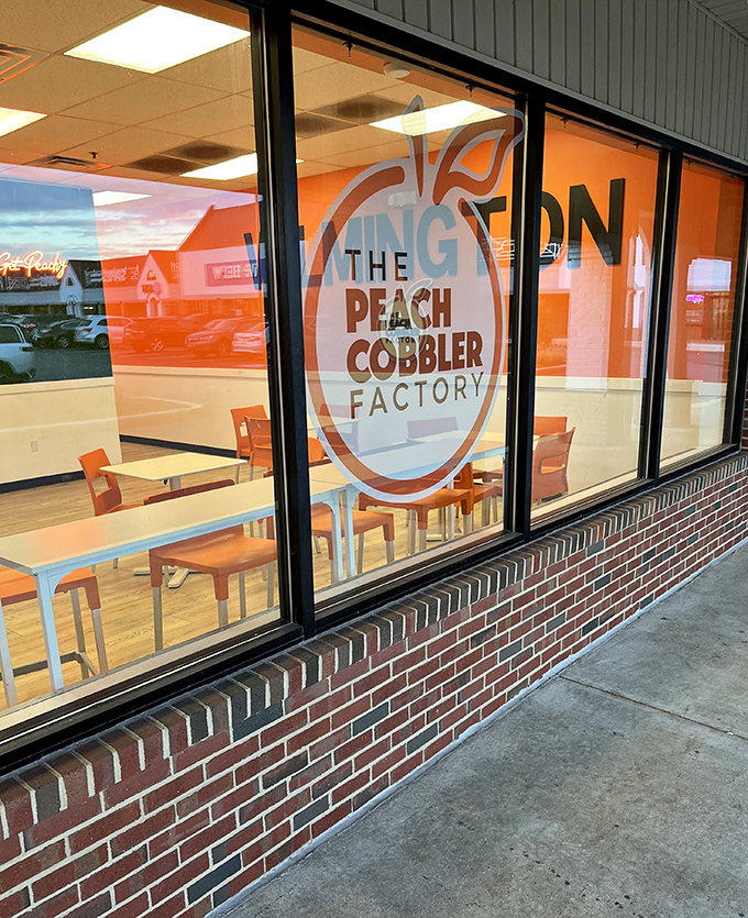 That cheerful storefront practically beckons with promises of warm, bubbling fruit desserts that'll transport you straight home.