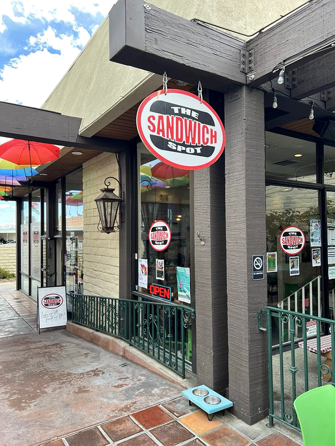 The green railings add whimsy, but it's the serious sandwich artistry that keeps this patio packed.