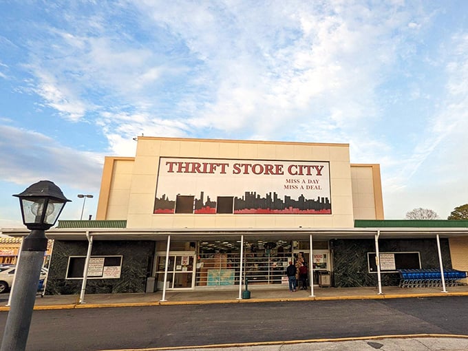 Evening light bathes Thrift Store City in a golden glow, transforming this humble thrift store into a cathedral of secondhand treasures.