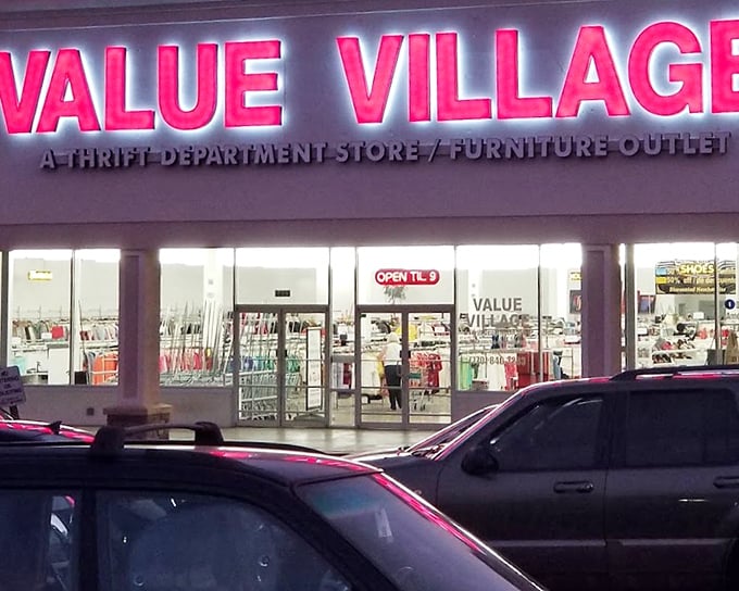 Glow after glow of Value Village lights promises rows of treasure waiting inside.