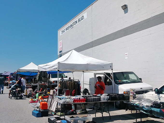 Tent city for treasure seekers. The outdoor section of Washington Boulevard transforms parking spots into possibility spots.