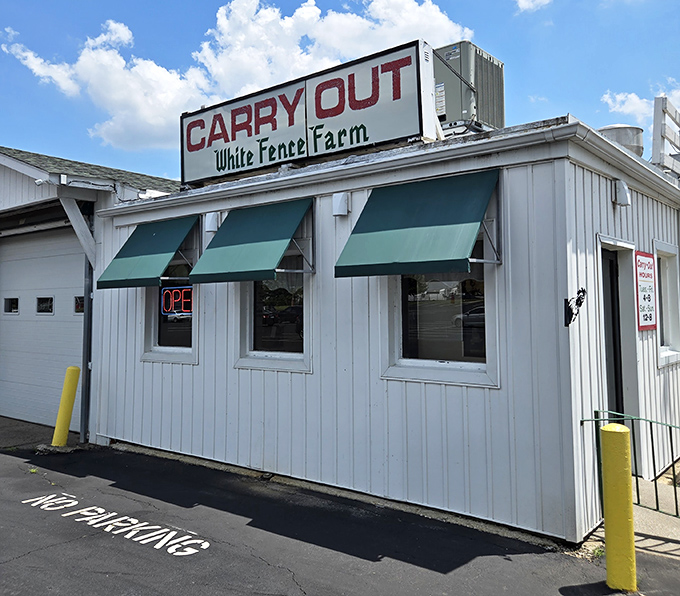 White Fence Farm proves that sometimes the best meals come with the simplest exteriors.