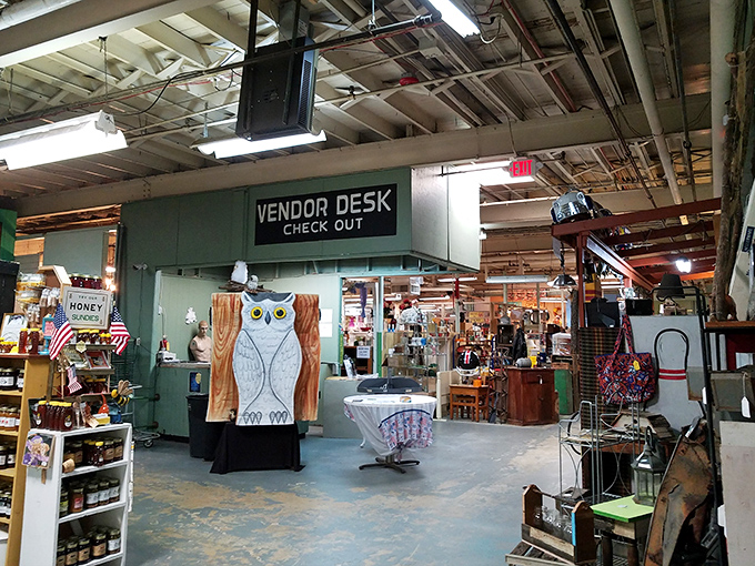 Inside White Owl, the vendor desk stands ready for commerce, with that wise owl watching over all transactions.