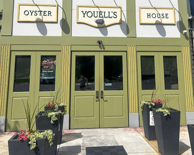 Yellow walls and green trim frame windows into a world where fresh oysters meet old-school Pennsylvania hospitality.