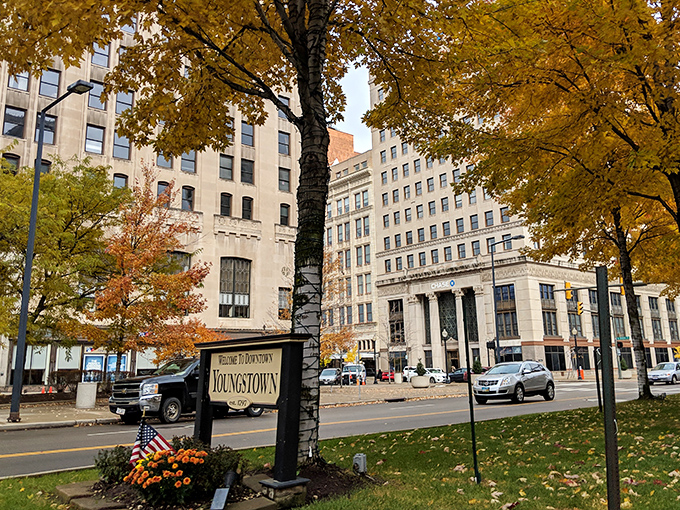 Youngstown's downtown welcomes visitors with a charming sign and autumn colors that make every season feel special.