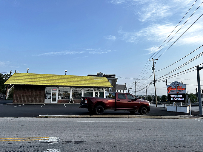 When the parking lot stays this full, you know the donuts inside are worth the wait.