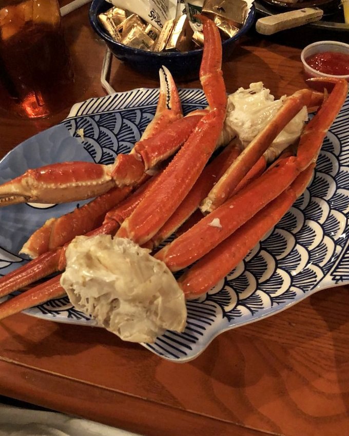 Snow crab legs: nature's way of saying "You're going to need both hands, a bib, and absolutely no dignity to enjoy me properly." Worth every messy moment.