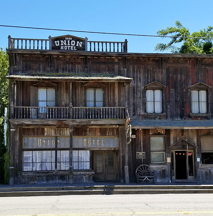 The 1880 Union Hotel stands as a magnificent time capsule. If these weathered wooden walls could talk, they'd need their own Netflix series.