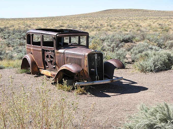 Detroit meets desert in this rusting time capsule. This abandoned Studebaker has found its final parking spot in a landscape as timeless as its design. 