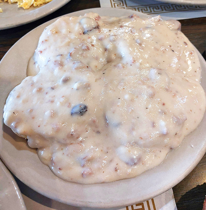 Behold the crown jewel of Country Way &ndash; biscuits smothered in sausage gravy so good, you'll want to write poetry about it. Breakfast alchemy at its finest.