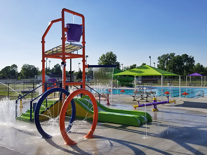 Summer in Ada means splashing around at the municipal pool, where this colorful water playground proves fun doesn't need a hefty admission price.