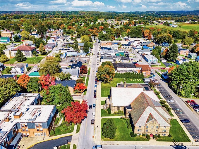 Fall foliage frames this aerial view of New Wilmington, where vibrant trees seem to be competing for "best dressed" in autumn.