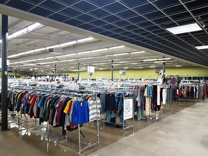 The clothing section stretches toward the horizon, a textile sea where fashion castaways find new life and new homes.