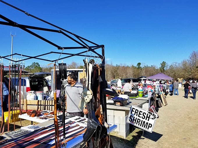 Fresh Shrimp signs neighbor fishing gear and household goods&mdash;proof that at Florence Flea Market, you never know what might be around the next corner. 