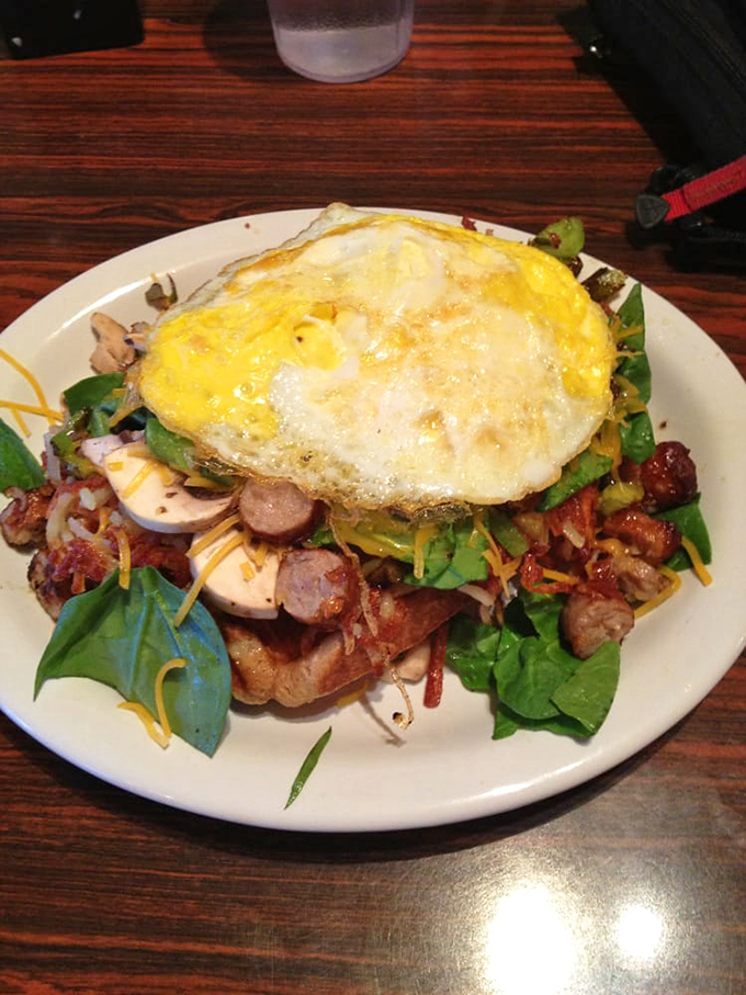 Breakfast architecture at its finest! This towering creation proves that sometimes more is exactly the right amount.