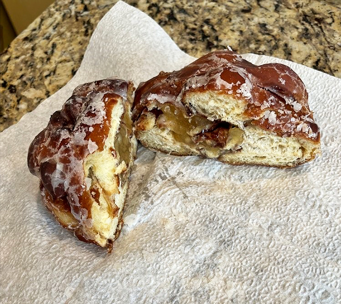 This apple fritter isn't just a pastry; it's an engineering marvel of crispy exterior, tender interior, and apple-cinnamon perfection.