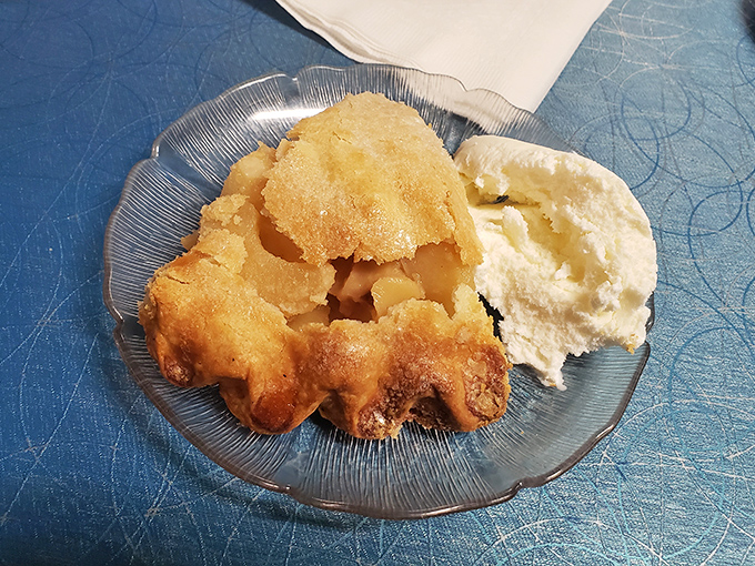 This isn't just apple pie &ndash; it's edible nostalgia with a side of ice cream. The golden crust practically whispers sweet nothings to your fork.