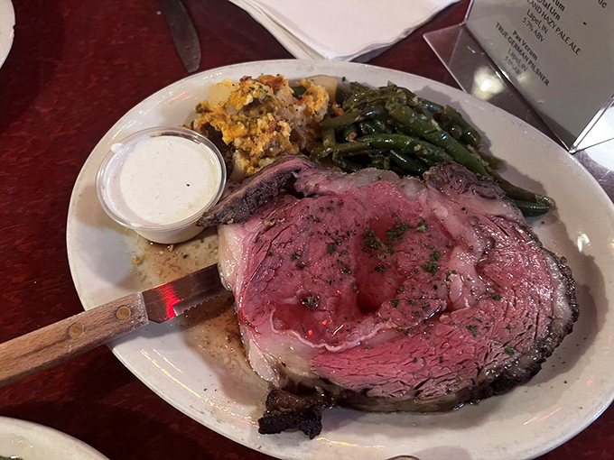 This prime rib isn't just dinner; it's a religious experience. The perfect pink center surrounded by a seasoned crust might make you consider moving to Perkinsville permanently.