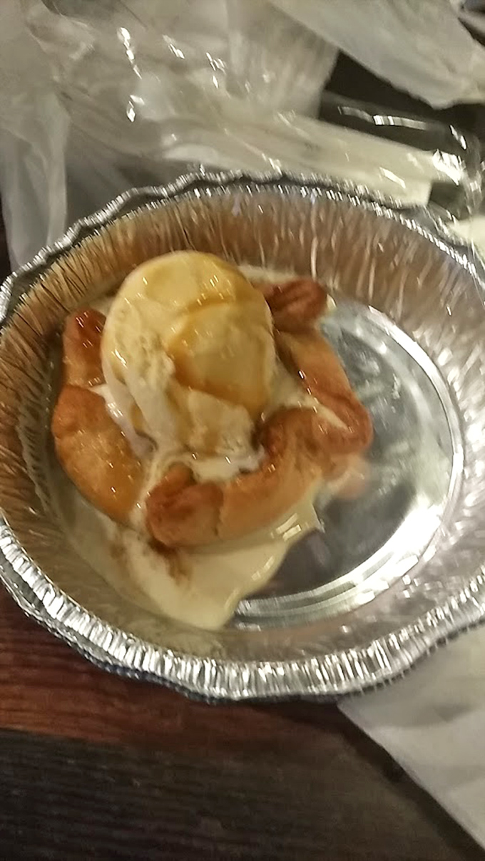 This isn't just dessert; it's a warm apple tart topped with ice cream that makes you wonder why you ever saved room.