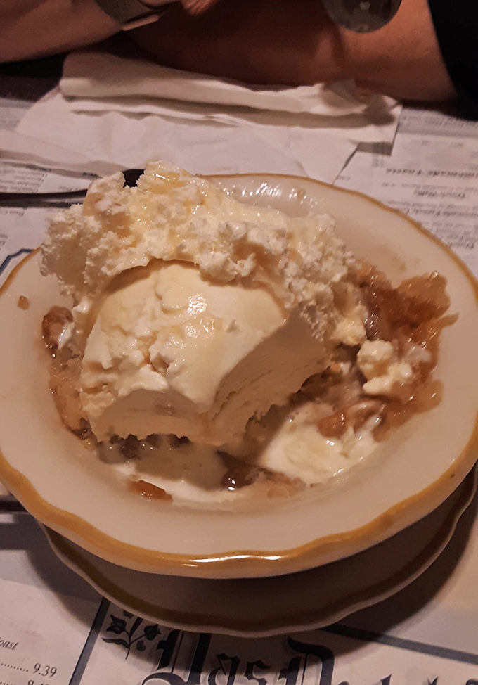 The legendary apple dumpling in all its glory&mdash;ice cream melting into warm pastry like it's found its soulmate after years of searching.