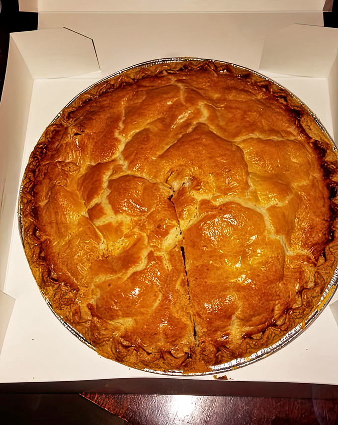 Behold the star attraction &ndash; a golden-domed apple pie with a crust so flaky it should be in the Pastry Hall of Fame.