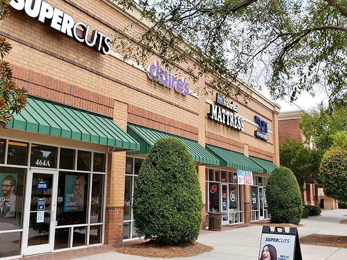 Strip mall shopping gets the Southern treatment with manicured shrubs that seem to say, "Yes, you can get a haircut AND buy a mattress in the same trip."