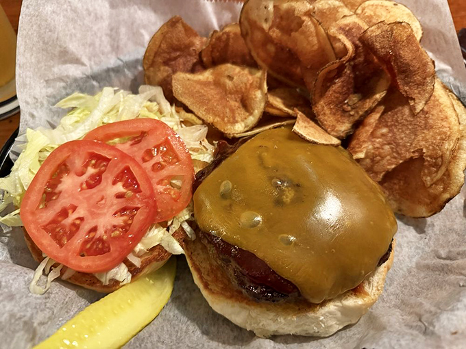 Behold the star of our show &ndash; a burger so perfectly executed it makes you question all other burgers you've ever loved. That melty cheese is pure poetry.