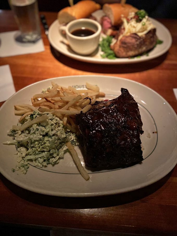 The star of the show: fall-off-the-bone ribs with that perfect bark, coleslaw that's actually worth eating, and fries crisp enough to make a Frenchman weep.