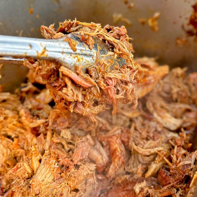 Behold the star of the show &ndash; pulled pork so tender it practically surrenders to the tongs, wearing its smoky credentials with pride.