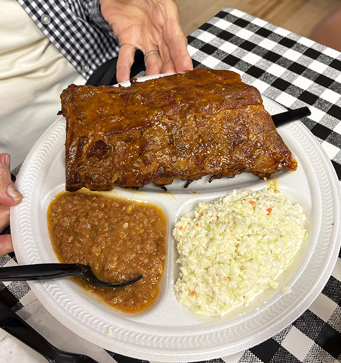 Behold the rib plate in all its glory&mdash;where Brunswick stew and coleslaw aren't mere sides, they're supporting actors in a meaty masterpiece.