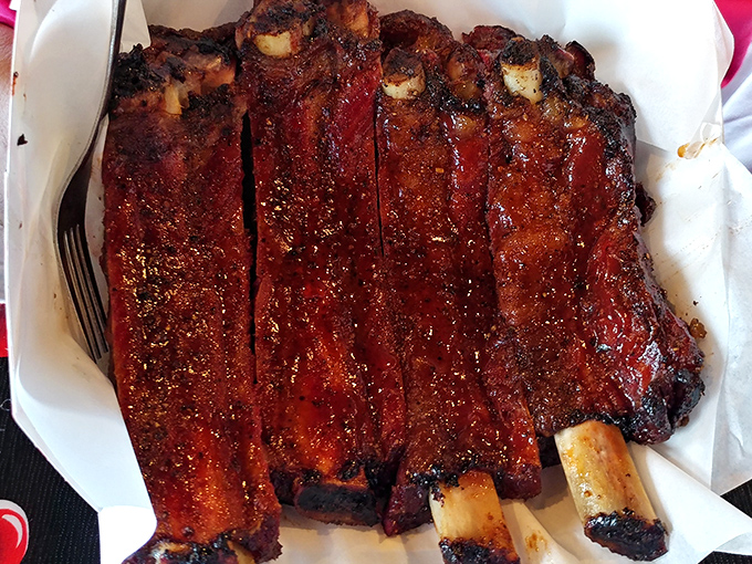 These ribs glisten like mahogany sculptures that happen to be deliciously edible works of art.