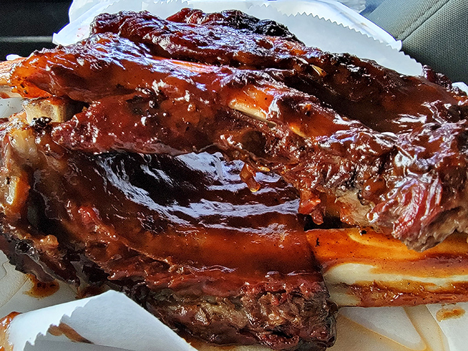 These ribs aren't falling off the bone&mdash;they're clinging to it with just enough resistance to prove they were smoked by someone who knows what they're doing.