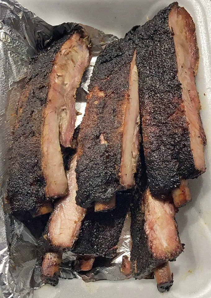 Smoke rings don't lie. These ribs have the kind of bark that makes tree trunks jealous and a pink smoke ring that BBQ judges dream about.