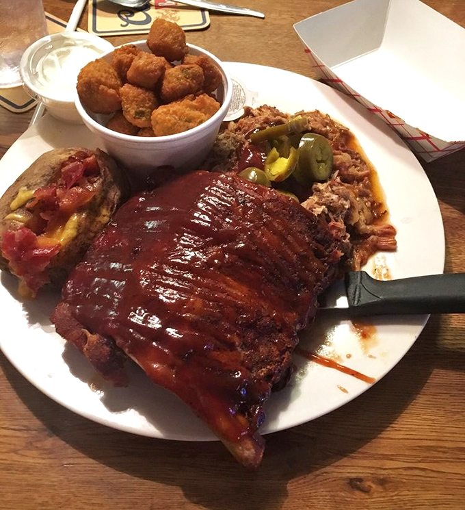 These ribs aren't just falling off the bone—they're practically jumping into your mouth. The sauce glistens with promise of sweet, tangy perfection.