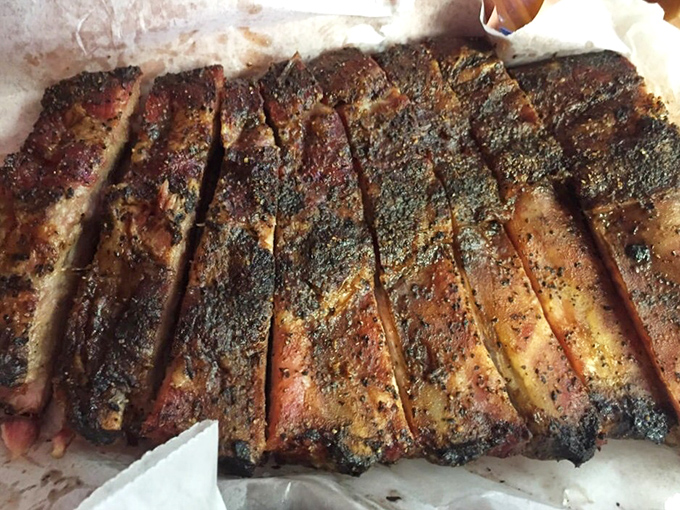 These ribs aren't "falling off the bone"&mdash;they're perfectly cooked with that ideal resistance that makes true barbecue aficionados swoon.