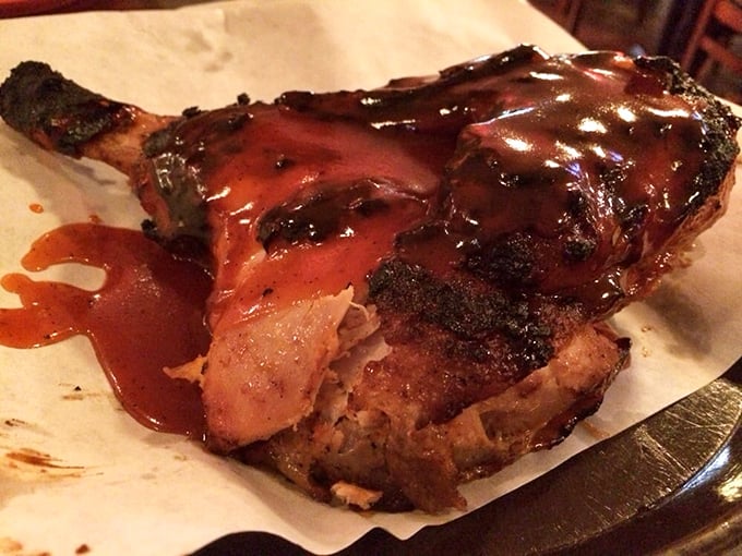 This chicken quarter isn't just cooked &ndash; it's been transformed into a glistening masterpiece that makes you question all other barbecue experiences.