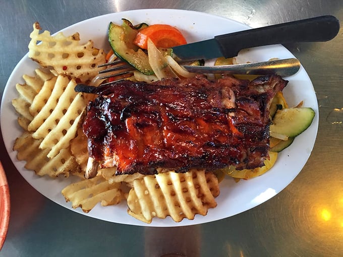 These BBQ ribs don't just fall off the bone&mdash;they practically leap into your mouth, bringing along waffle fries that deserve their own fan club.