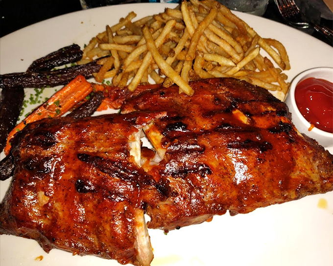 These baby back ribs don't need a jingle &ndash; their glistening, caramelized exterior and fall-off-the-bone tenderness sing for themselves.