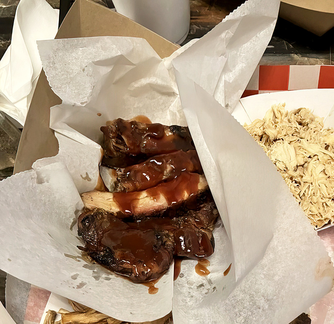 These ribs don't just fall off the bone&mdash;they practically leap into your mouth with smoky, saucy enthusiasm. Napkins required, regrets impossible.