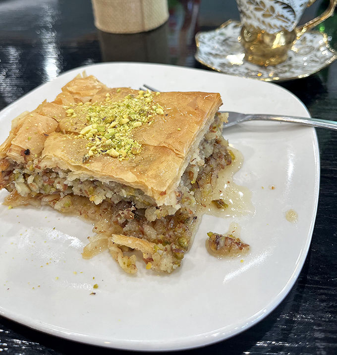 Baklava that makes mathematicians weep – layer upon perfect layer of phyllo, honey, and pistachios creating an equation for pure dessert bliss.