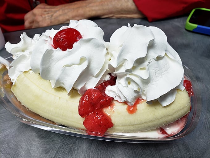 Behold the banana split that broke the internet! A masterpiece of fruit, cream, and cherry-topped decadence that makes diets weep with jealousy.