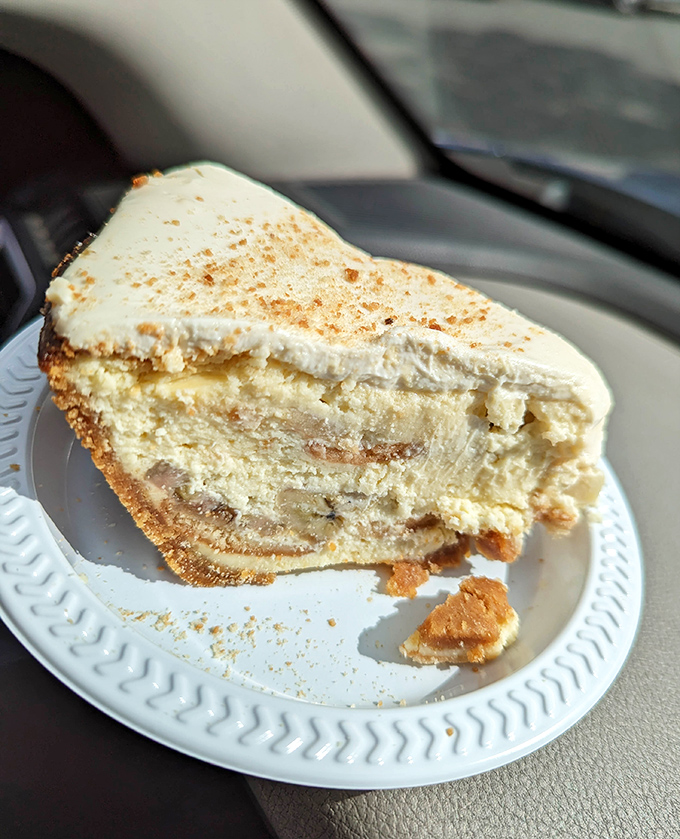 Banana pudding transformed into cheesecake form? This slice proves that sometimes the best innovations happen when two perfect desserts decide to get married.