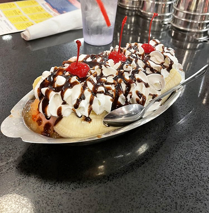 Behold the banana split in all its glory&mdash;a yellow canoe navigating rivers of hot fudge, crowned with whipped cream mountains and cherry beacons.