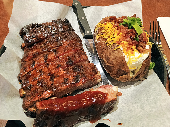 These ribs practically fall off the bone before you touch them, accompanied by that loaded potato of pure indulgence.