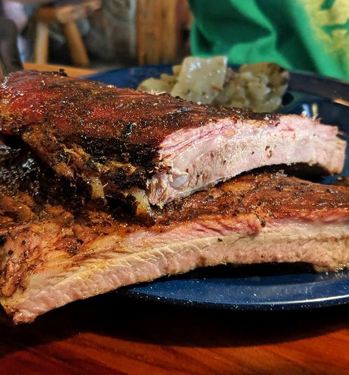 Behold, the pinnacle of pork perfection! These ribs showcase that coveted pink smoke ring&mdash;visual evidence of the pitmaster's patience and skill.