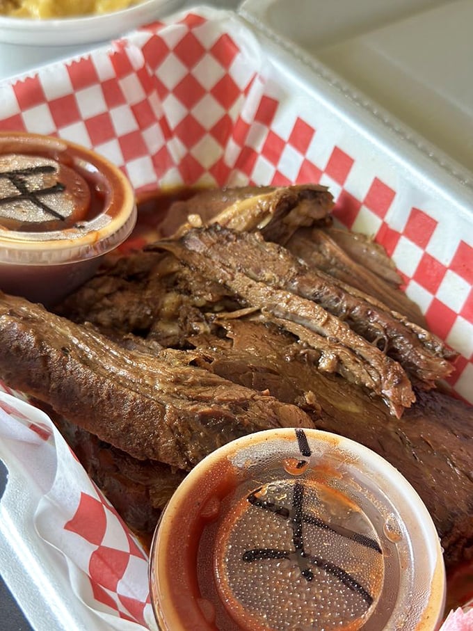 Behold the brisket in all its bark-encrusted glory. Those glistening slices with their telltale smoke ring are what barbecue dreams&mdash;and impromptu road trips&mdash;are made of.
