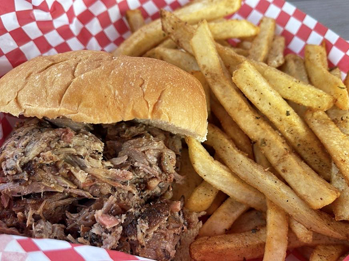 This isn't just a sandwich—it's a monument to patience. That brisket spent more time getting ready than most people do for their wedding day.