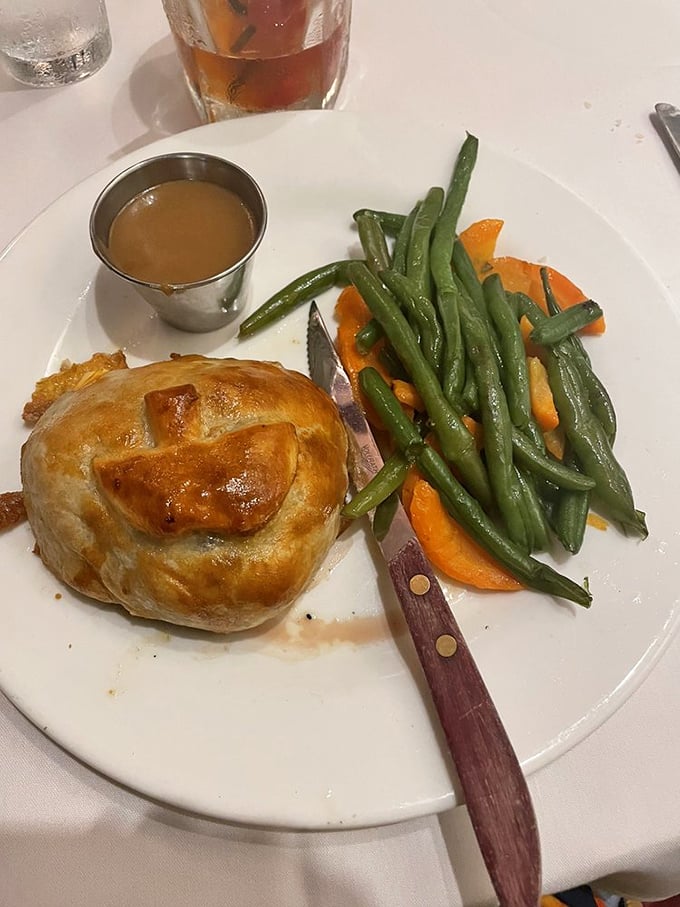 Beef Wellington done right&mdash;a golden pastry treasure chest protecting perfectly cooked beef. Worth every calorie.