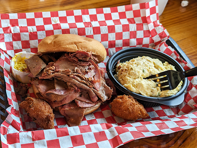 This isn't just a sandwich; it's a meaty monument to smoke and patience, with slices of beef piled higher than your weekend expectations.